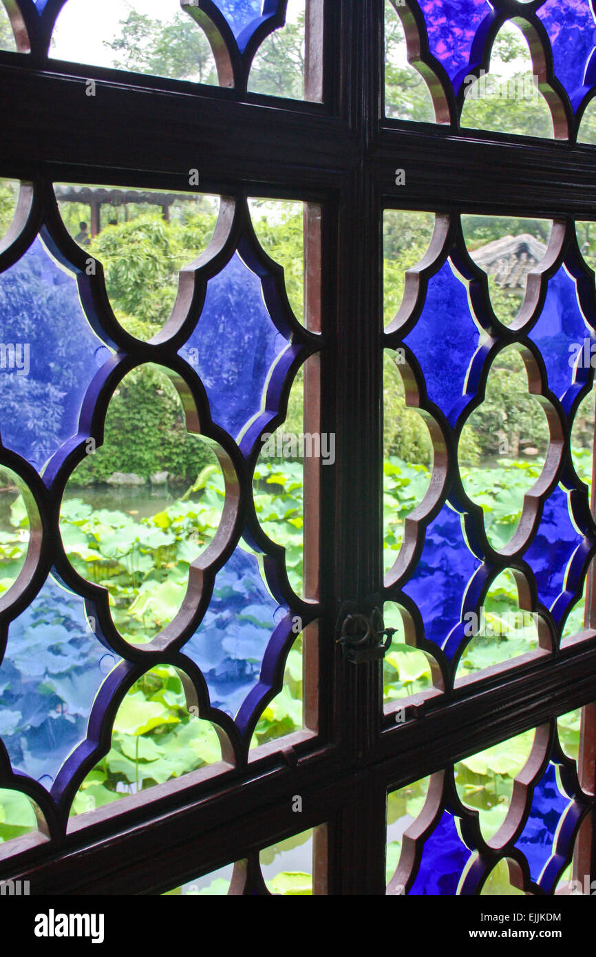 beautiful stained glass pavilion overlooking the lake with lotuses ...