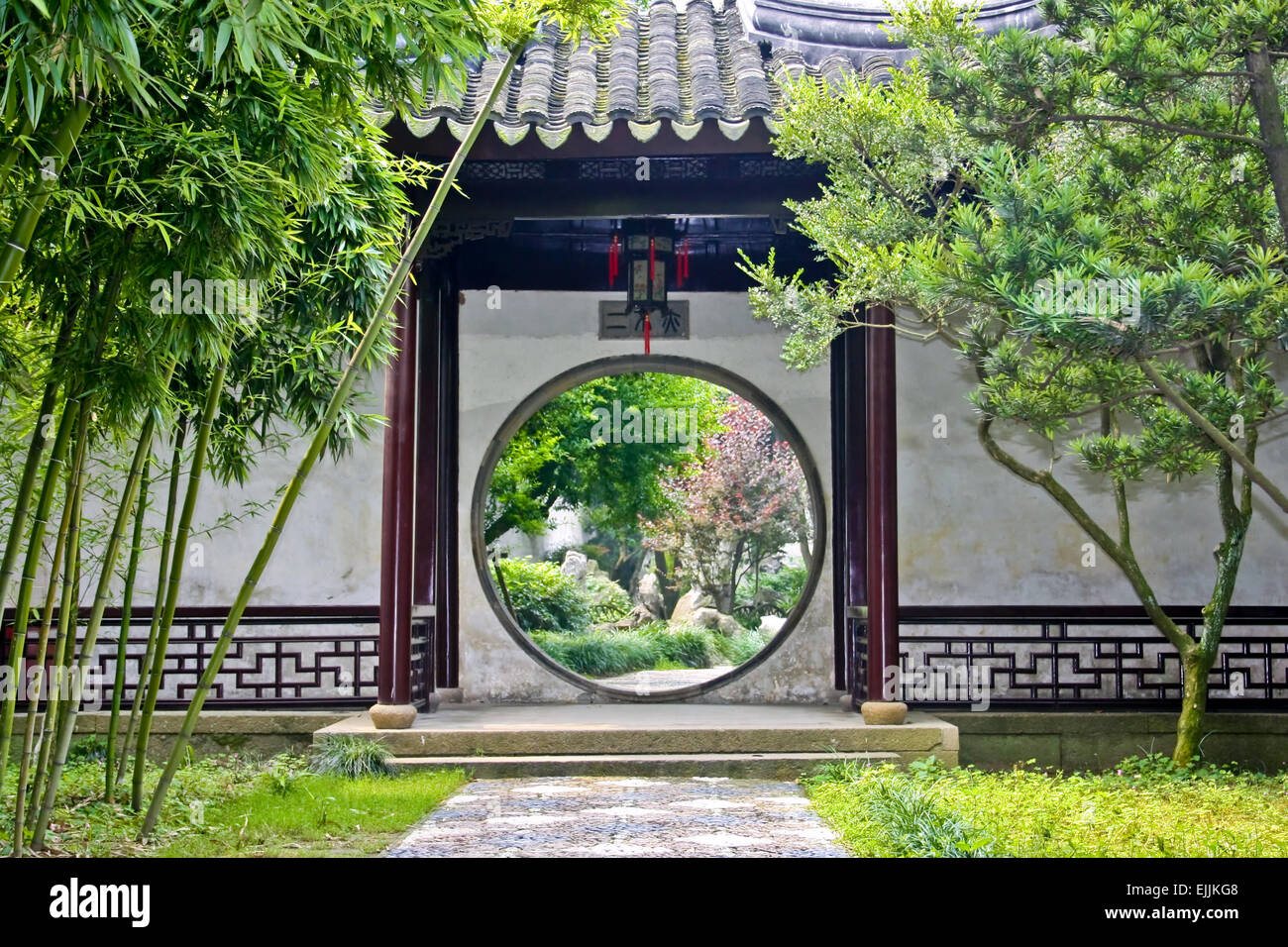 Decorative and original gates to the Chinese garden Stock Photo - Alamy