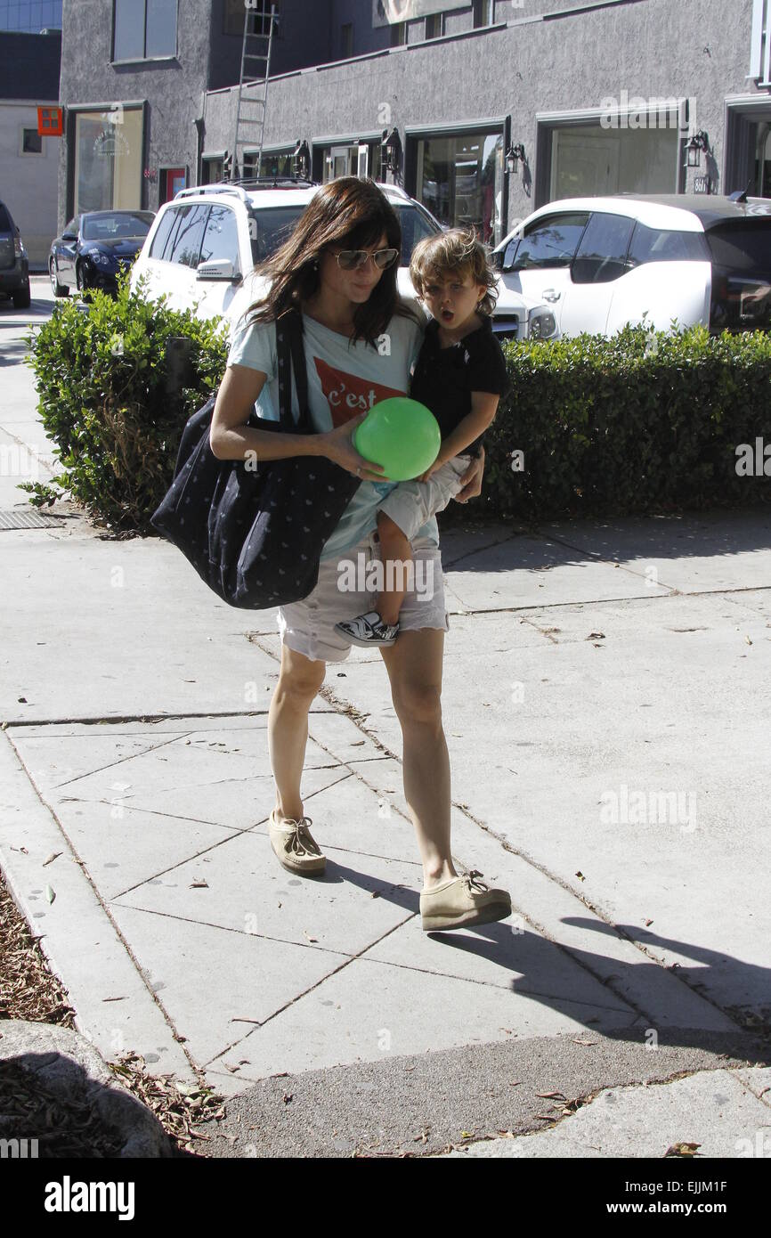 Selma Blair carries her son Arthur Bleick as they go shopping at Kitson ...