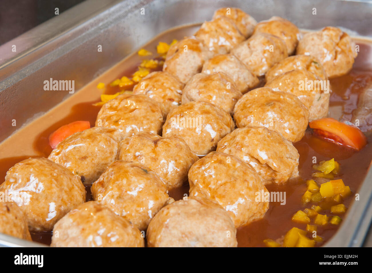 Closeup showing a row of bread dumplings on display at a hotel ...