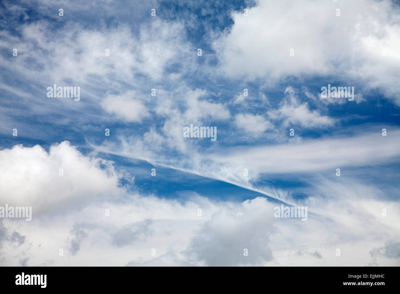 Cirrus, cumulus and stratocumulus clouds Stock Photo - Alamy