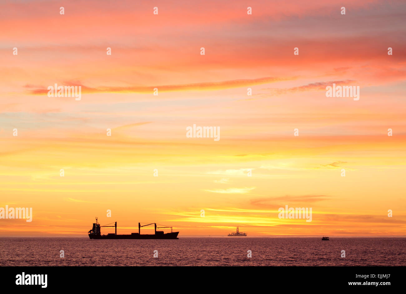 Cargo ship in Table Bay, Cape Town, South Africa Stock Photo - Alamy