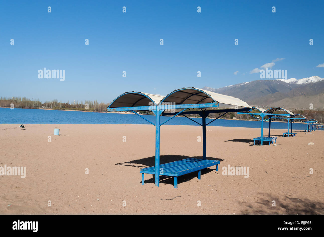 Empty beach at Issyk-Kul Lake in the spring. Cholpon-Ata. Kyrgyzstan ...