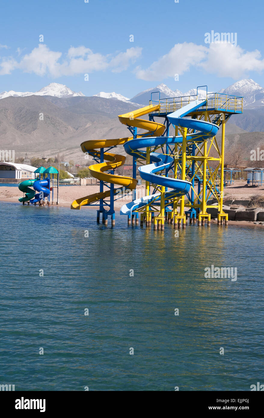 Water slide on the beach at Issyk-Kul Lake in the spring. Cholpon-Ata ...