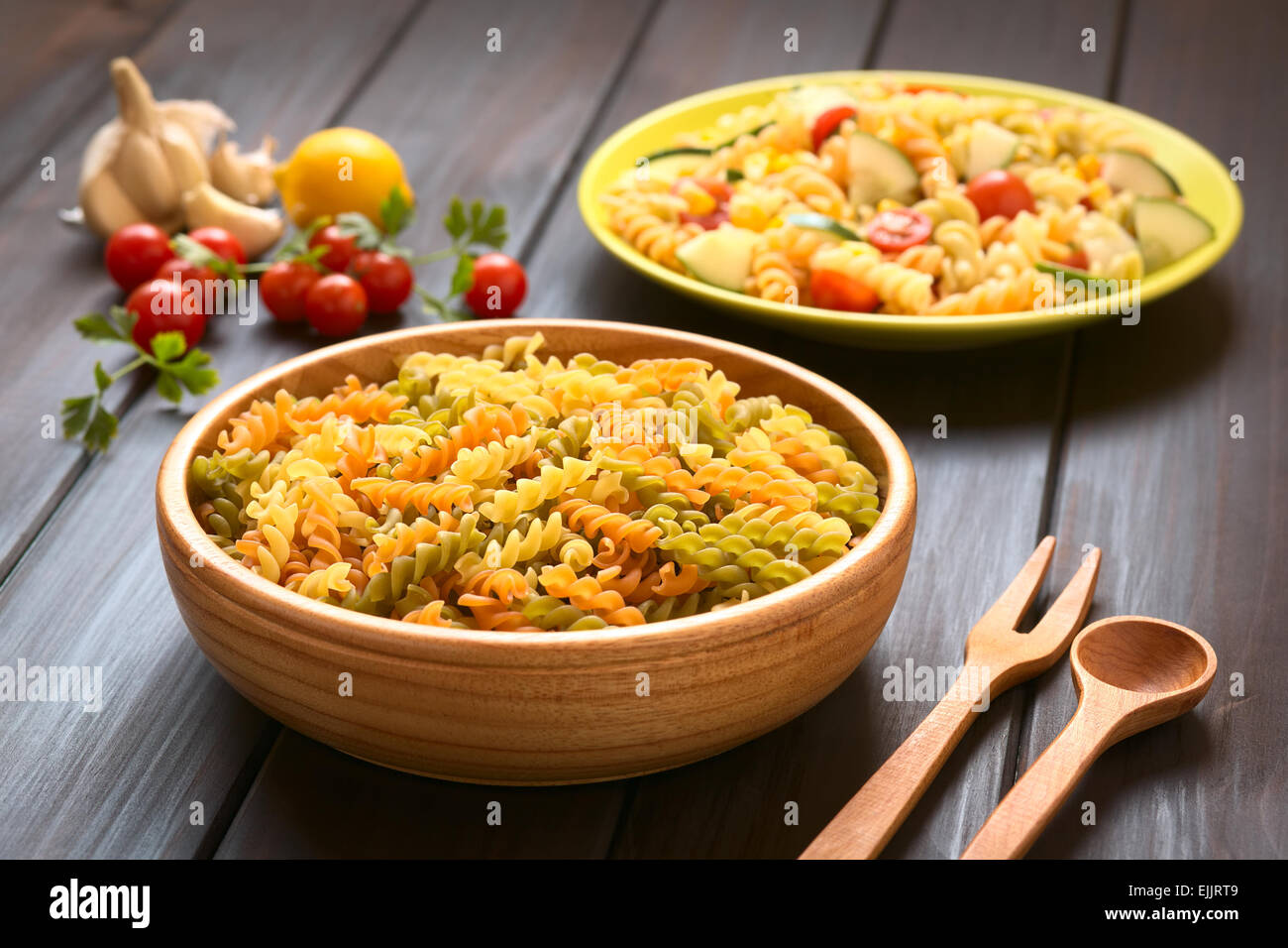 Raw tricolor fusilli or rotini pasta (traditional, tomato and spinach ...
