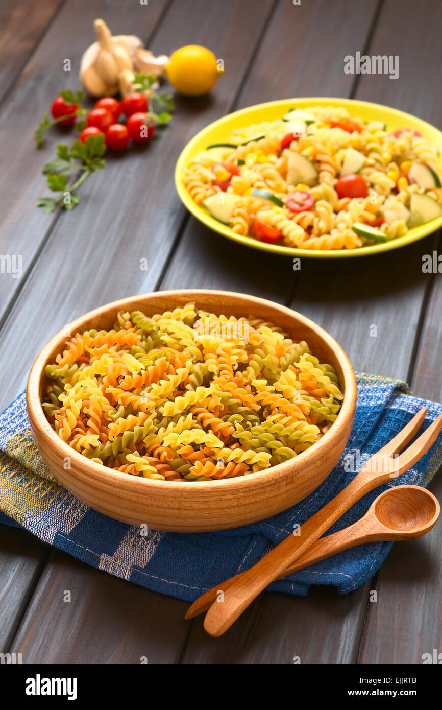 Raw tricolor fusilli or rotini pasta (traditional, tomato and spinach ...