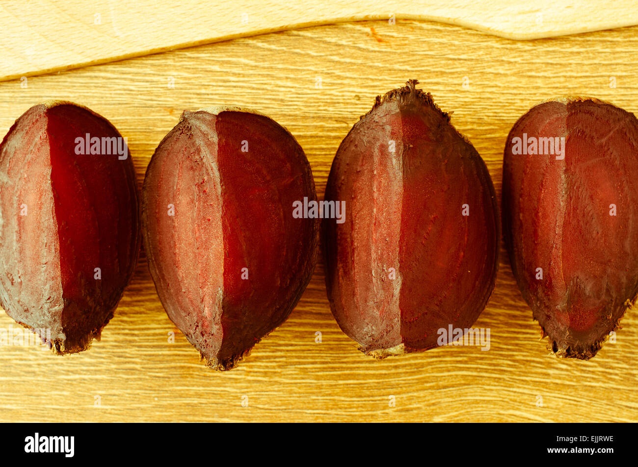 Beets slices with a wooden spoon top view Stock Photo - Alamy