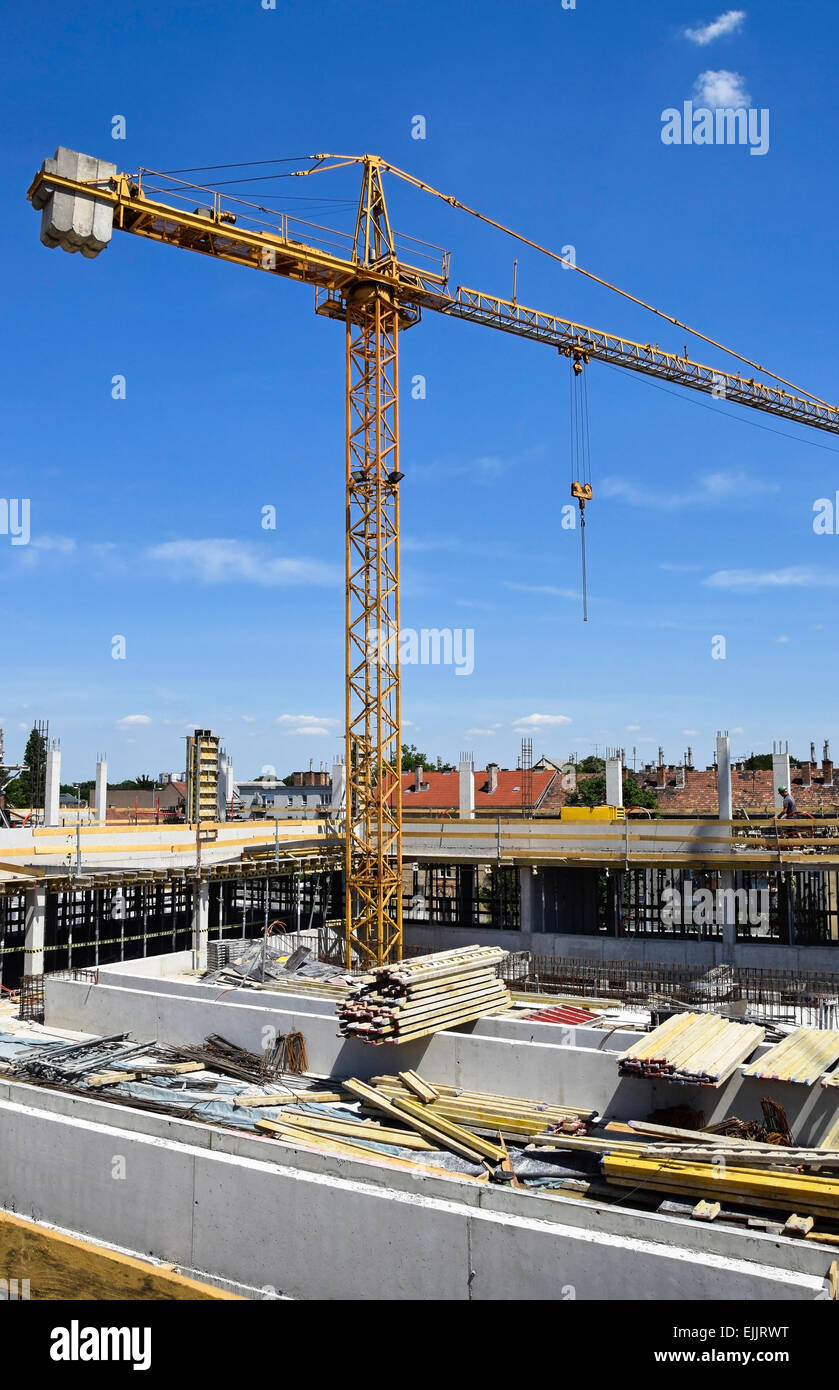 Tower crane at the construction site Stock Photo - Alamy