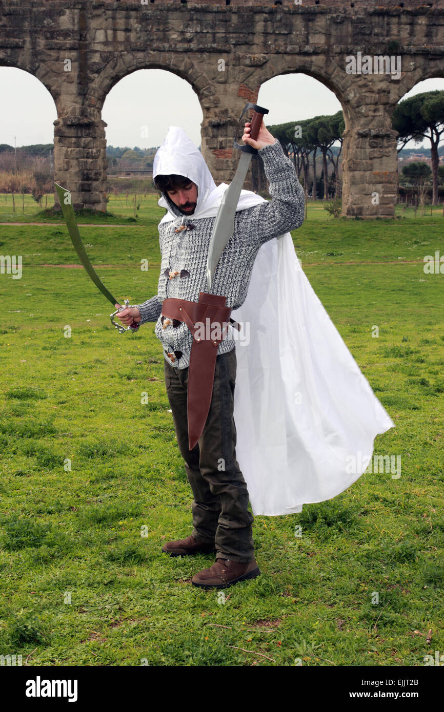 Medieval knight under ancient Roman ruins Stock Photo - Alamy