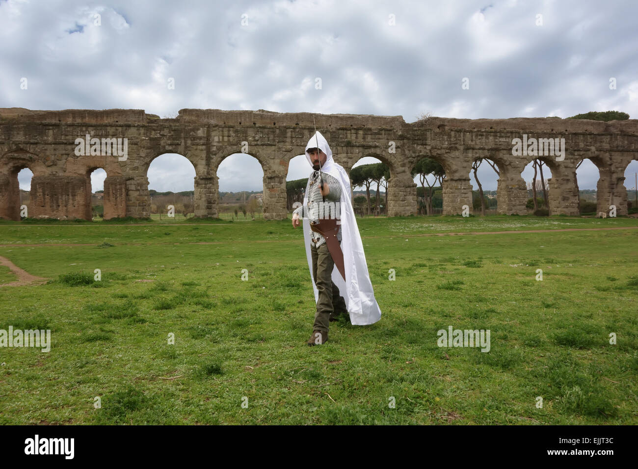 Medieval knight under ancient Roman ruins and stormy sky Stock Photo ...