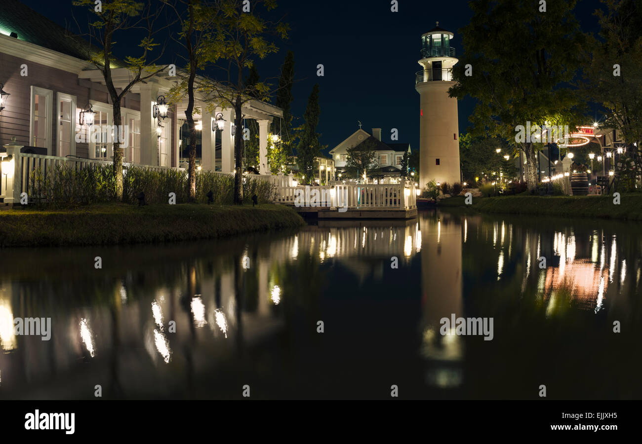 Lighthouse at Chocolate Ville Bangkok during night Stock Photo - Alamy