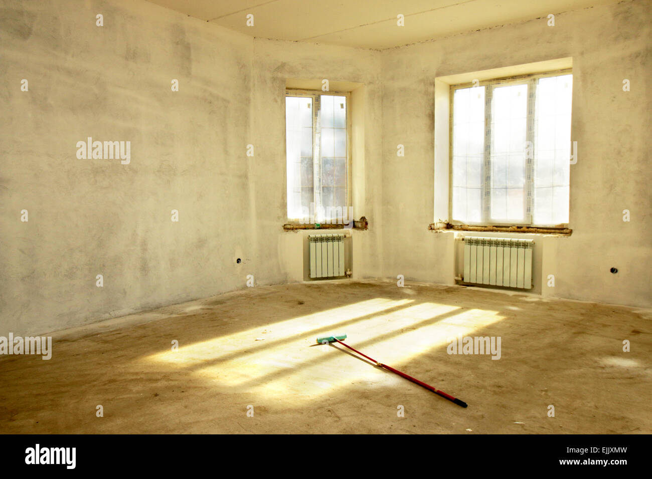 Interior of the new room without finishing in the newly built high-rise ...