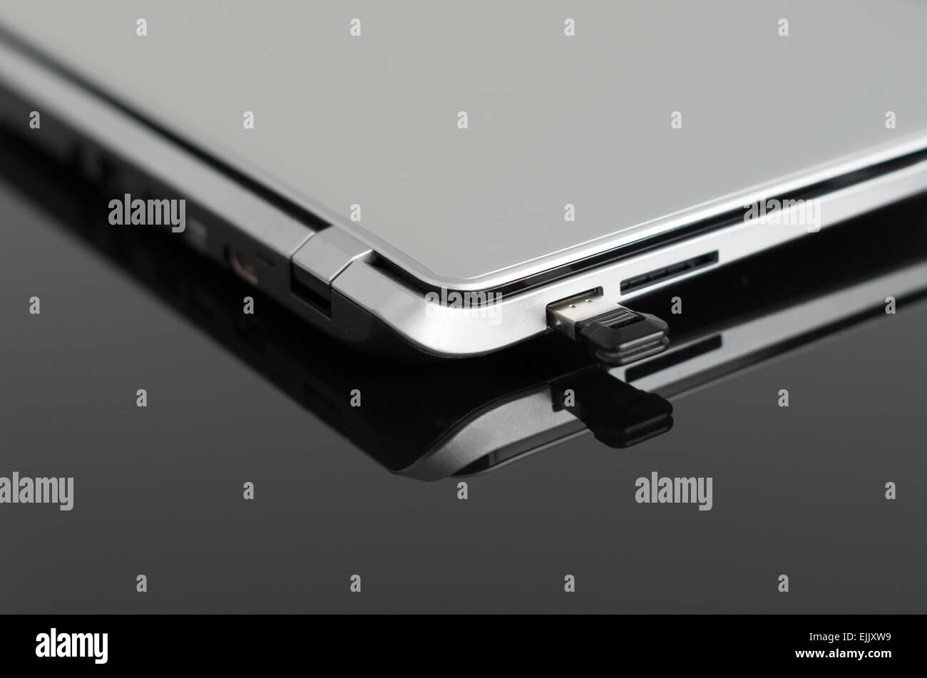 Usb flash drive connected to laptop Stock Photo - Alamy