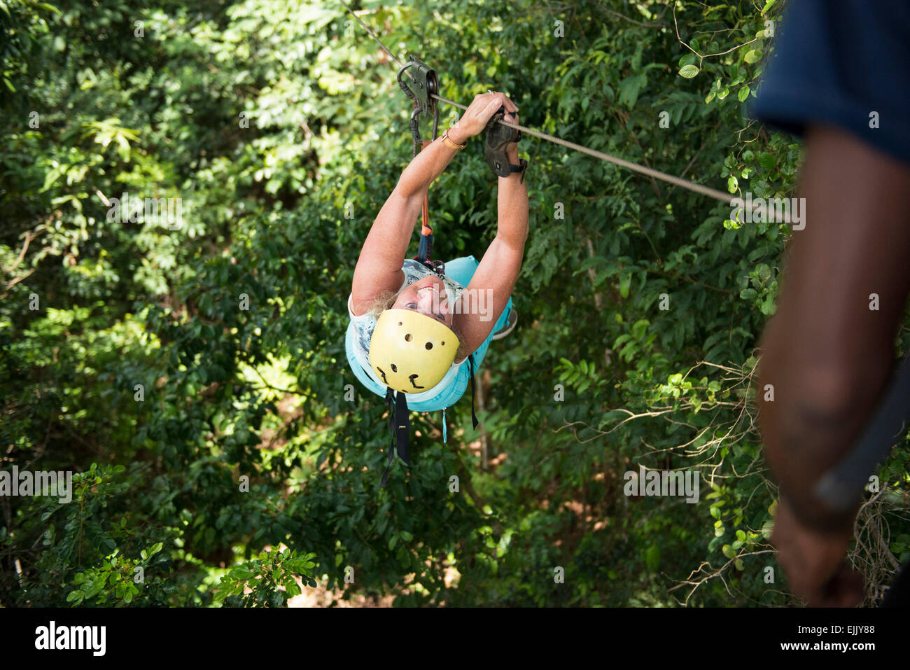Sliding along the Canopy Zip Line at Bergendal Adventure Centre ...