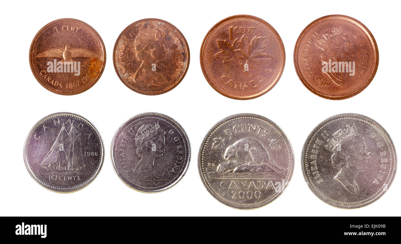 four old canadian coins isolated on white background Stock Photo - Alamy