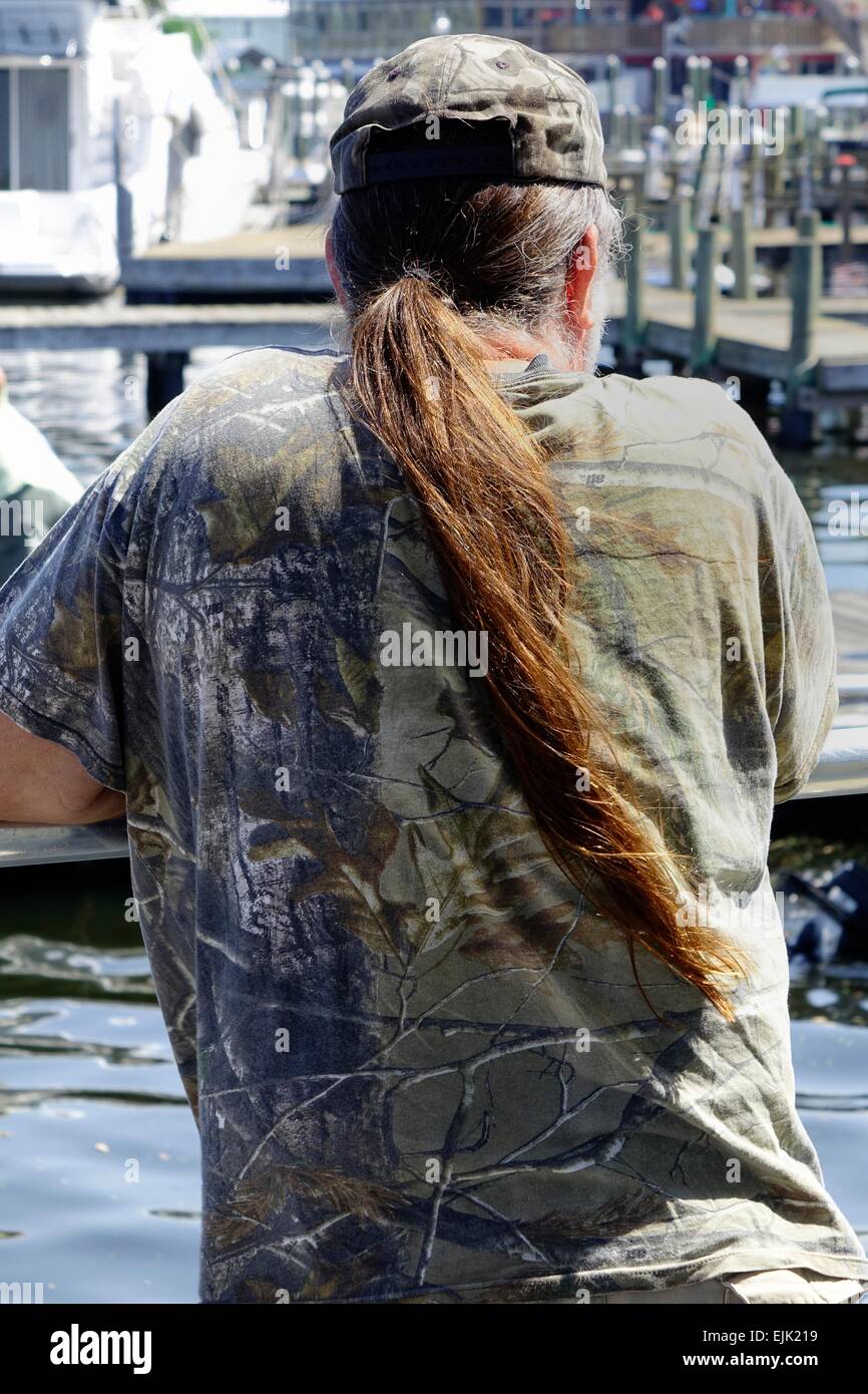 Man with pony tail Stock Photo - Alamy