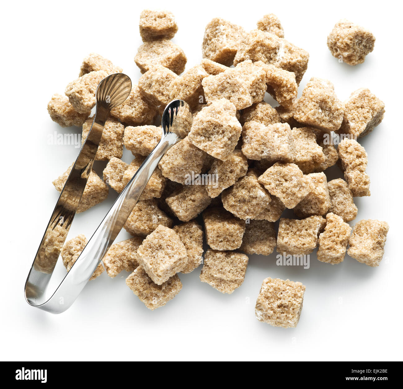 Cubes of cane sugar on white background Stock Photo - Alamy