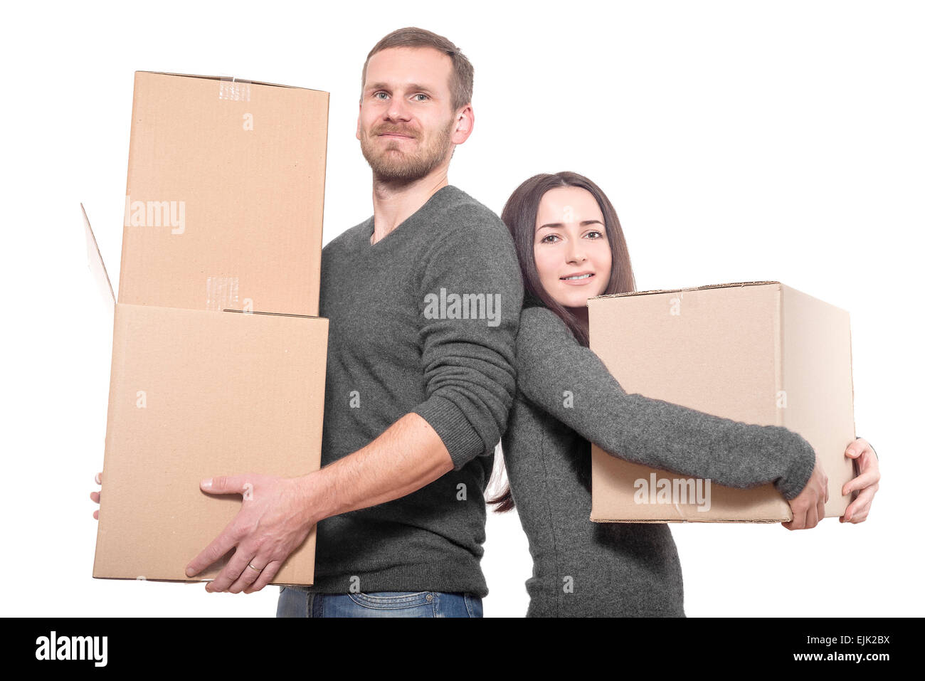 Couple with moving boxes Stock Photo - Alamy