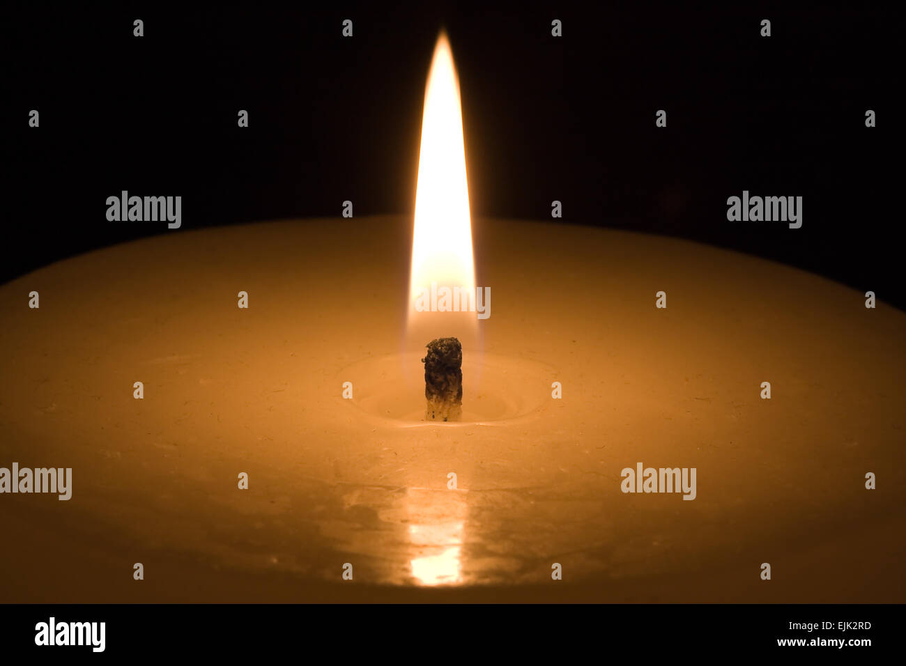 Candlelight in the dark Stock Photo - Alamy