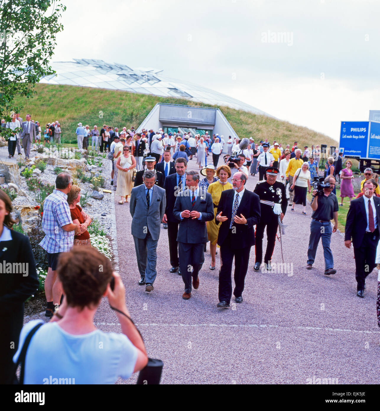 Prince Charles walks with Professor Charles Stirton and others outside ...