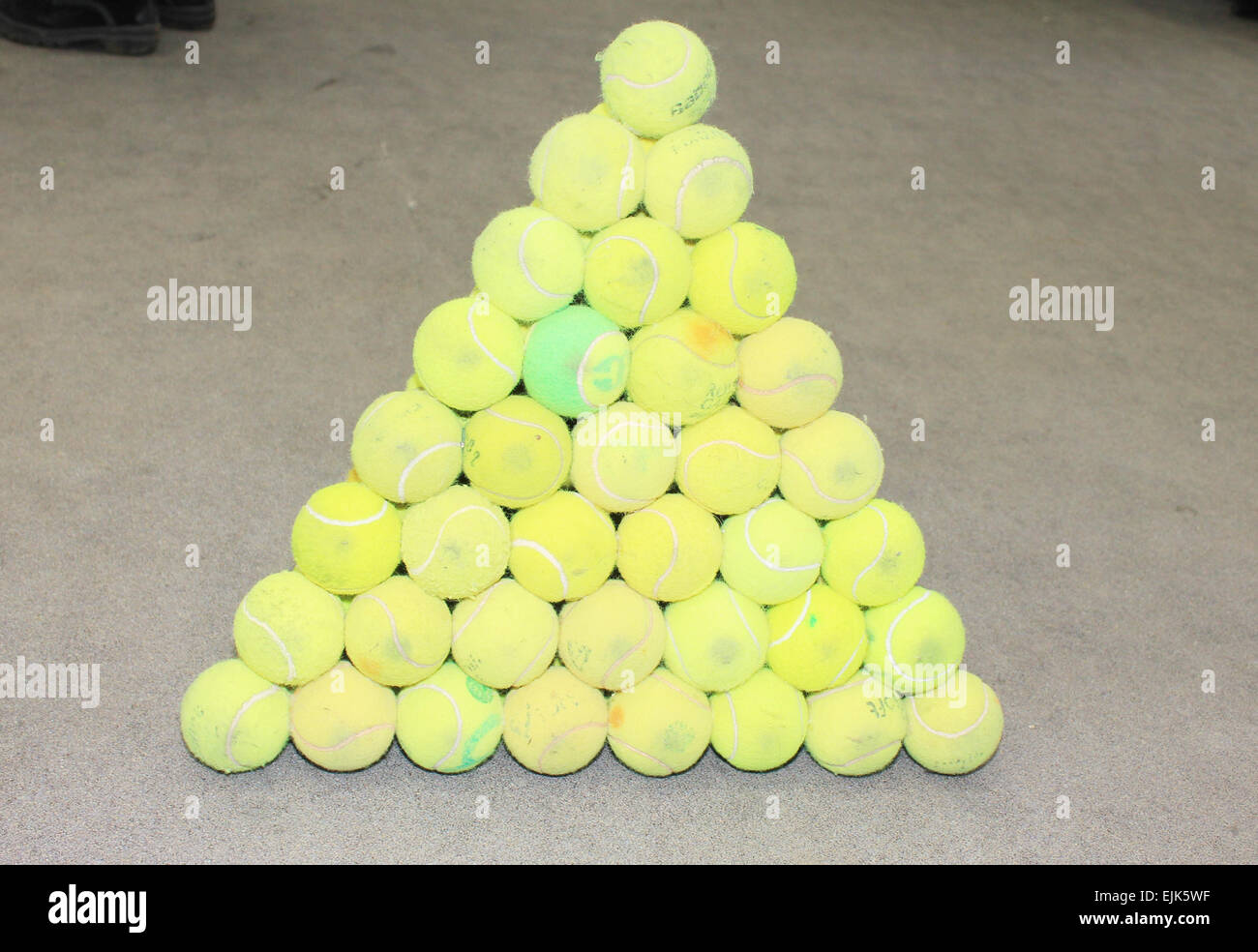 Tennis balls collected in the form a pyramid. Set of tennis balls Stock ...
