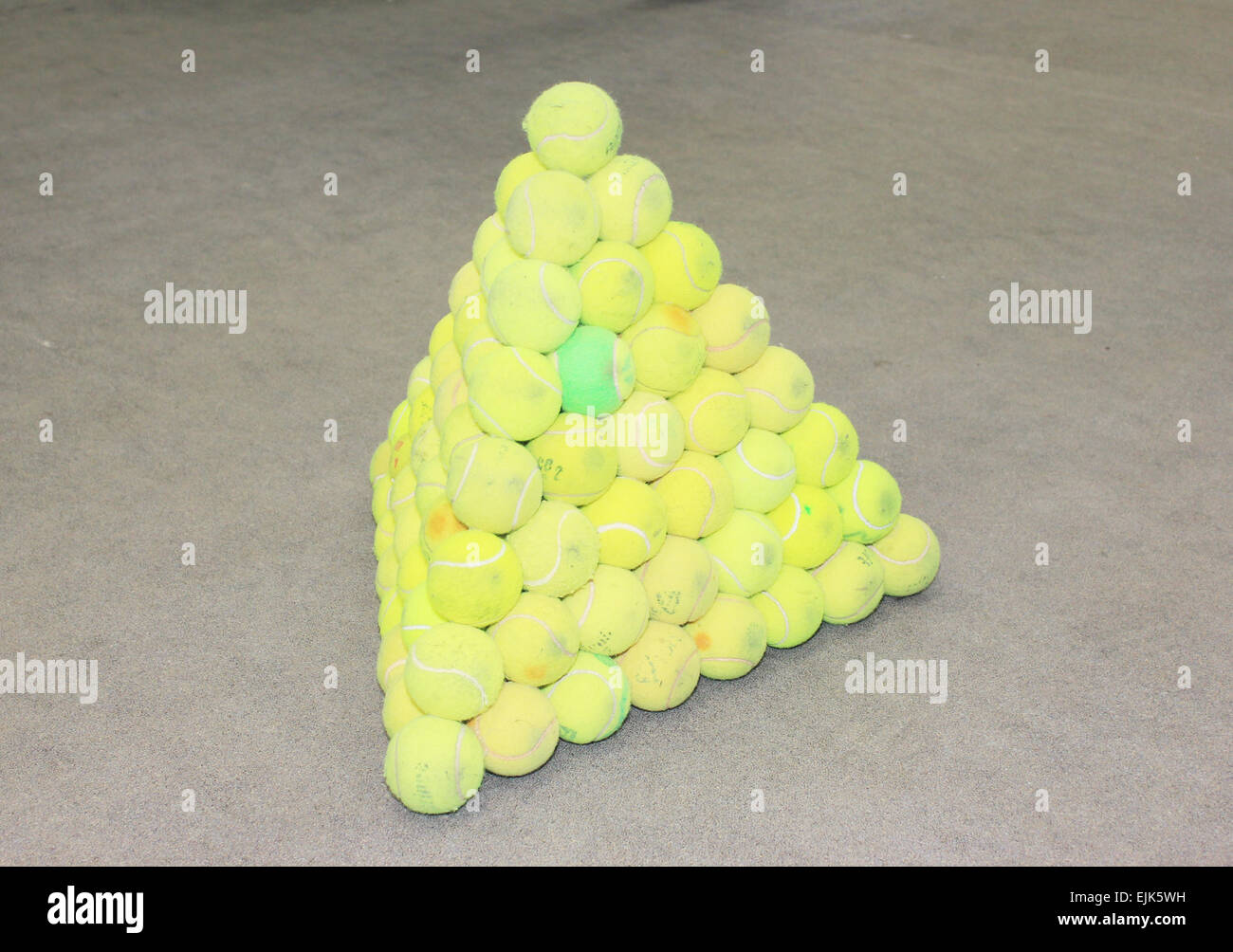 Tennis balls collected in the form a pyramid. Set of tennis balls Stock ...