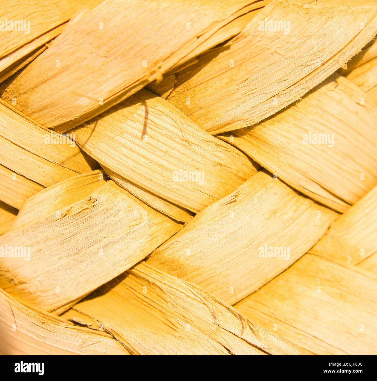 Yellow wicker background at sun light. Wooden texture Stock Photo - Alamy