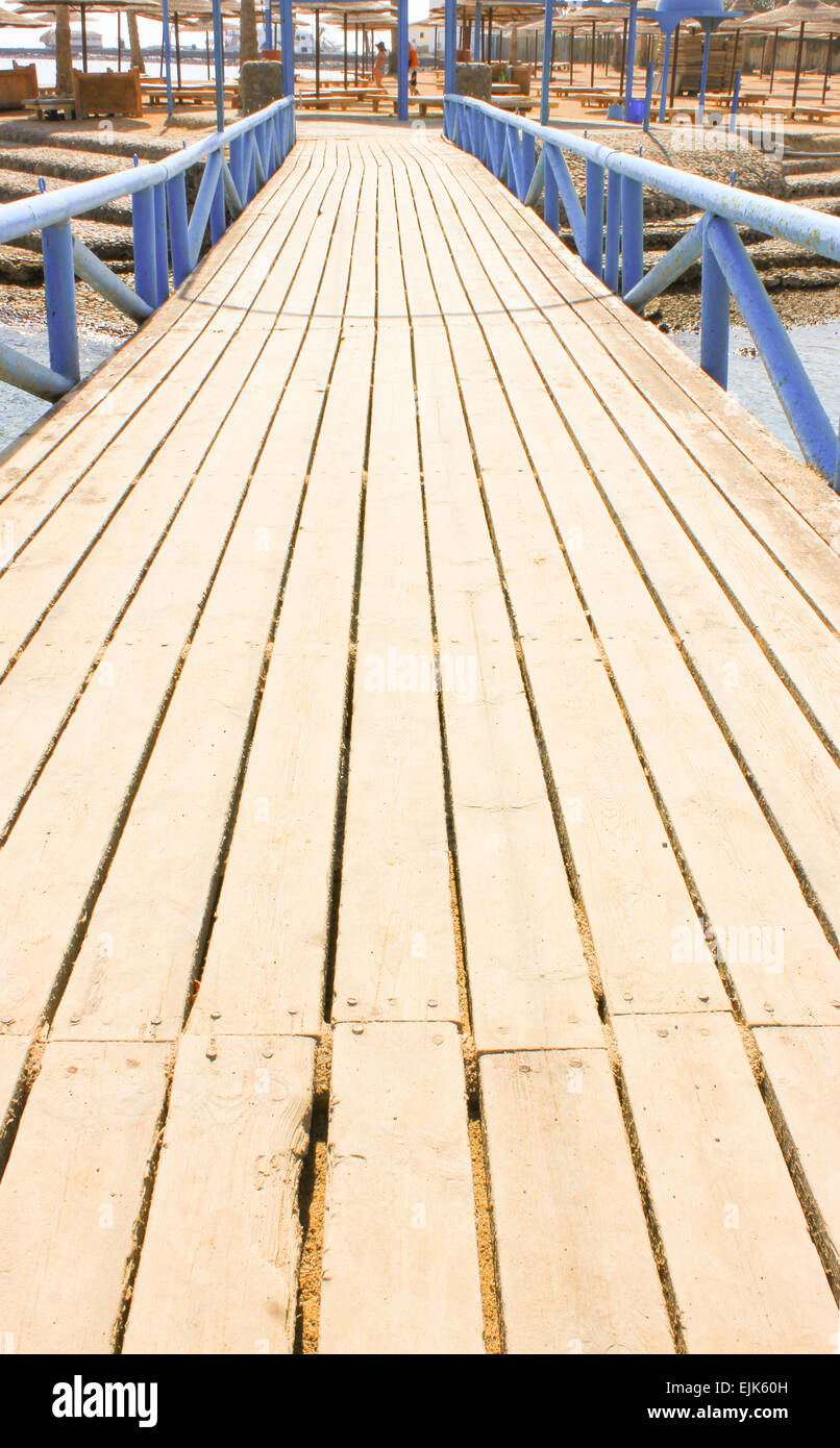 Wooden bridge on the beach shore Stock Photo - Alamy