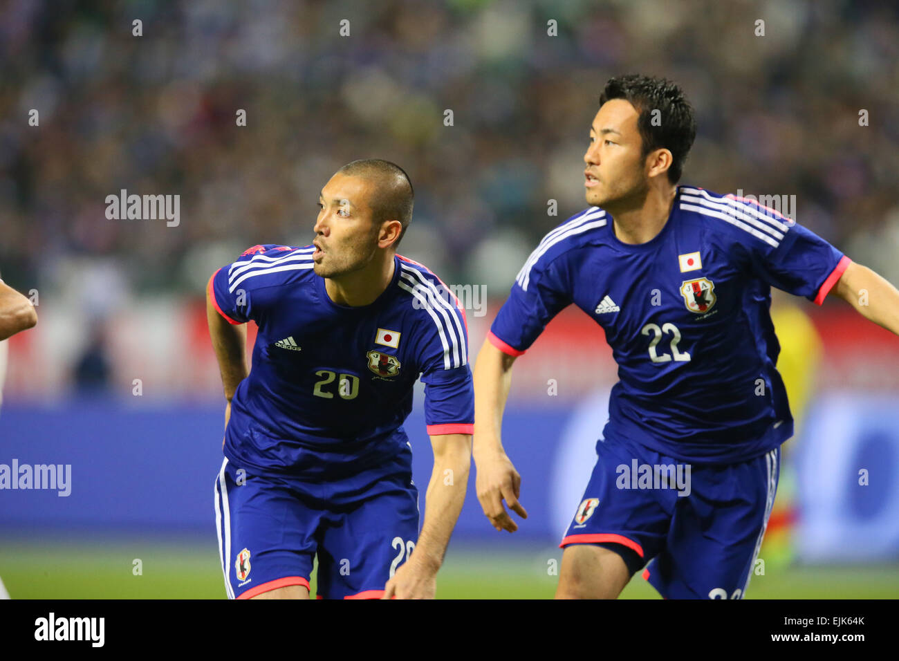 Oita Sports Park Stadium, Oita, Japan. 27th Mar, 2015. (L to R) Kengo Kawamata, Maya Yoshida ...