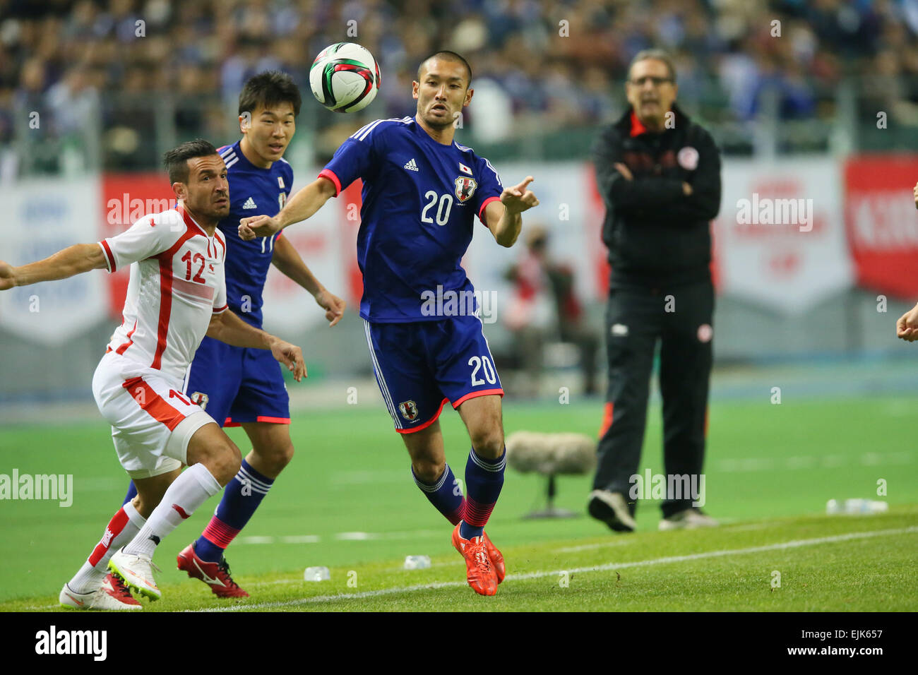 Oita Sports Park Stadium, Oita, Japan. 27th Mar, 2015. (L to R) Kensuke Nagai, Kengo Kawamata ...
