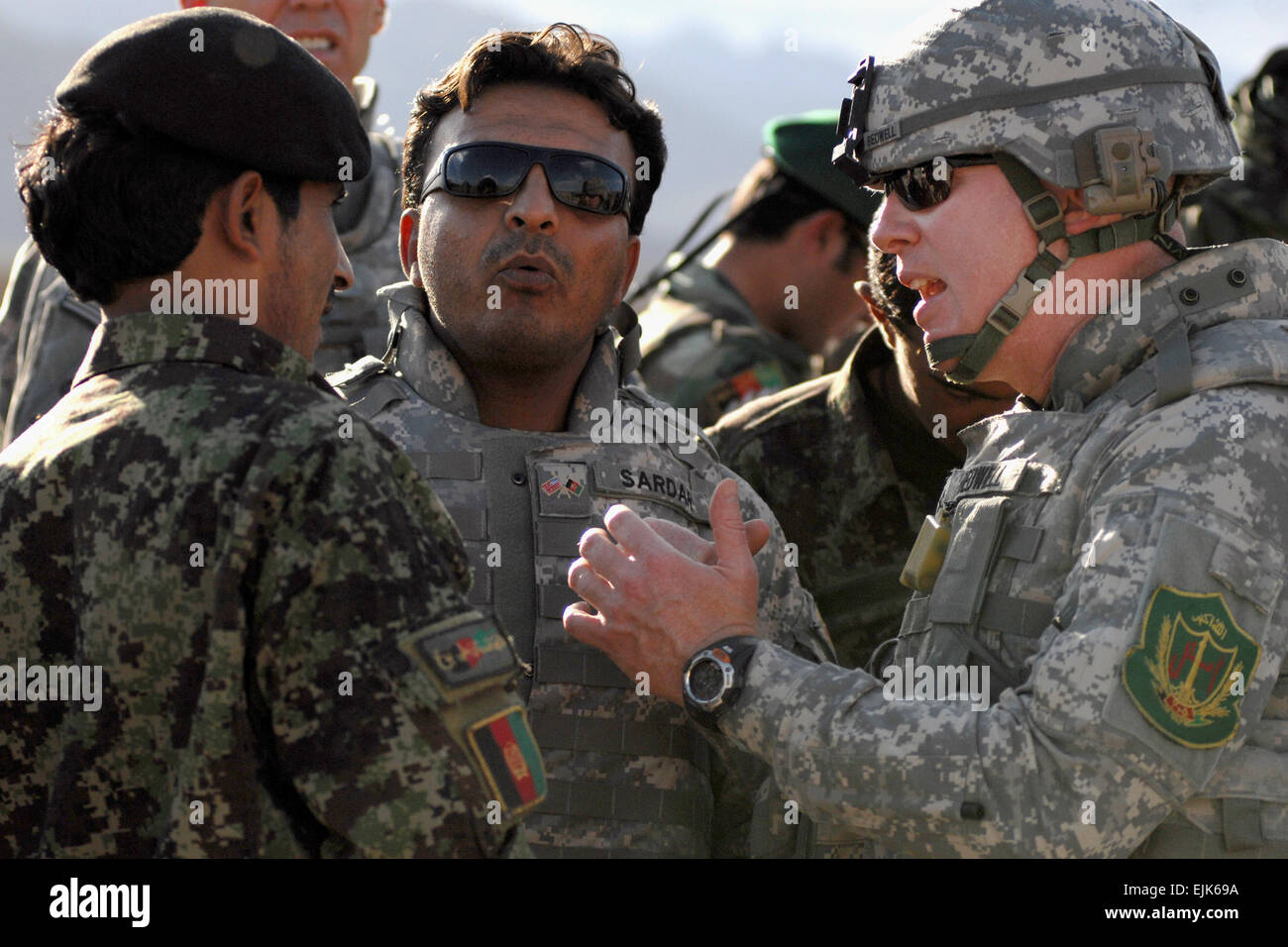 U.S. Army Lt. Col. Matthew Bedwell, right, discusses operational and ...