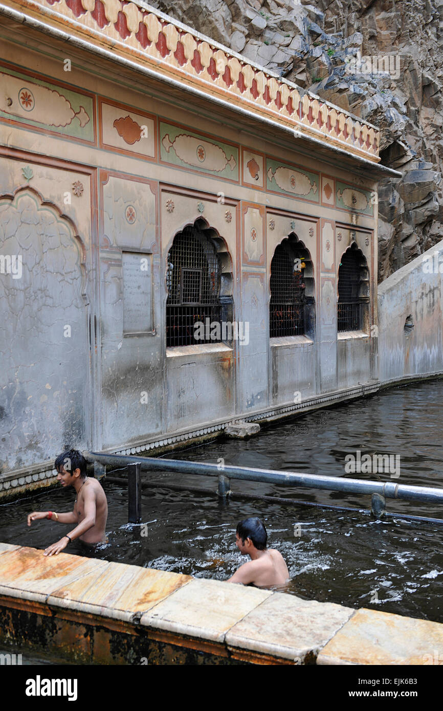 Men bathing in the water tanks of the Monkey Temple (Galwar Bagh ...