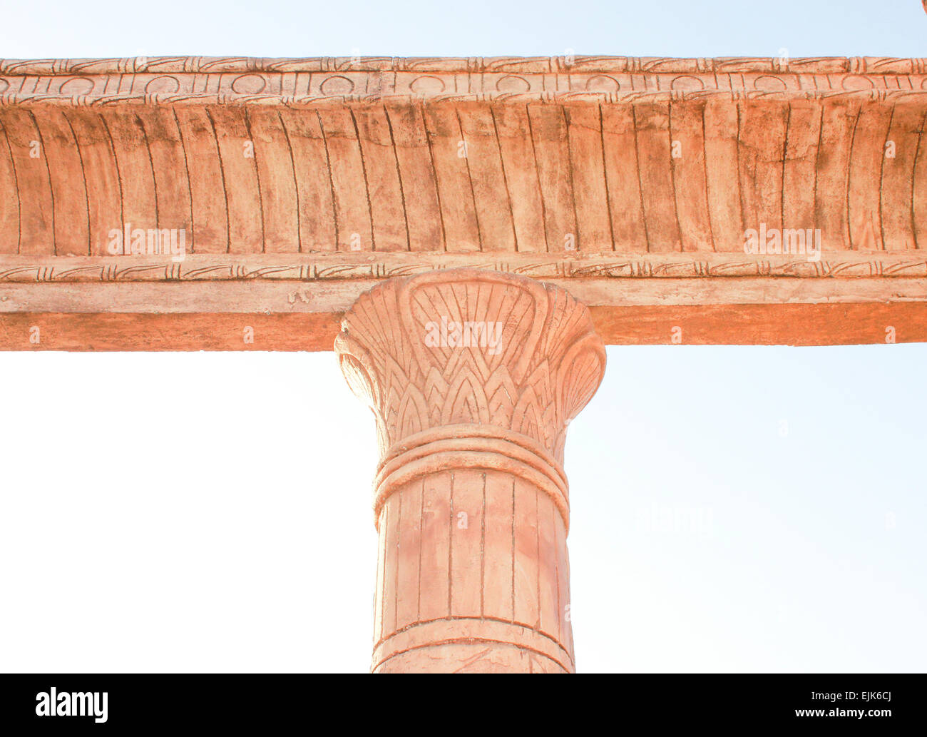 Single Column at sun light. Column on blue sky background Stock Photo ...