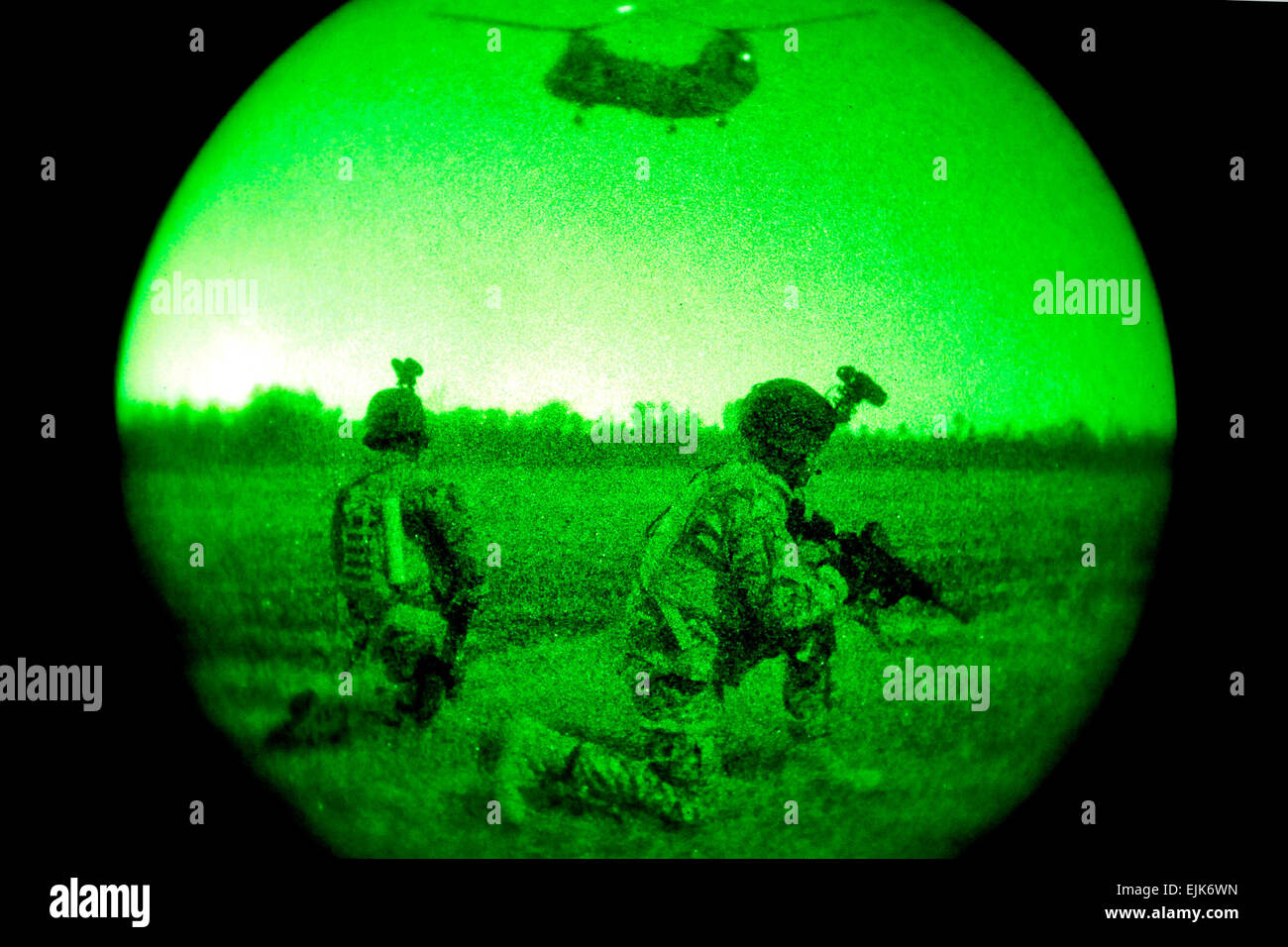 U.S. Army Soldiers conduct a night raid mission during Emerald Warrior ...