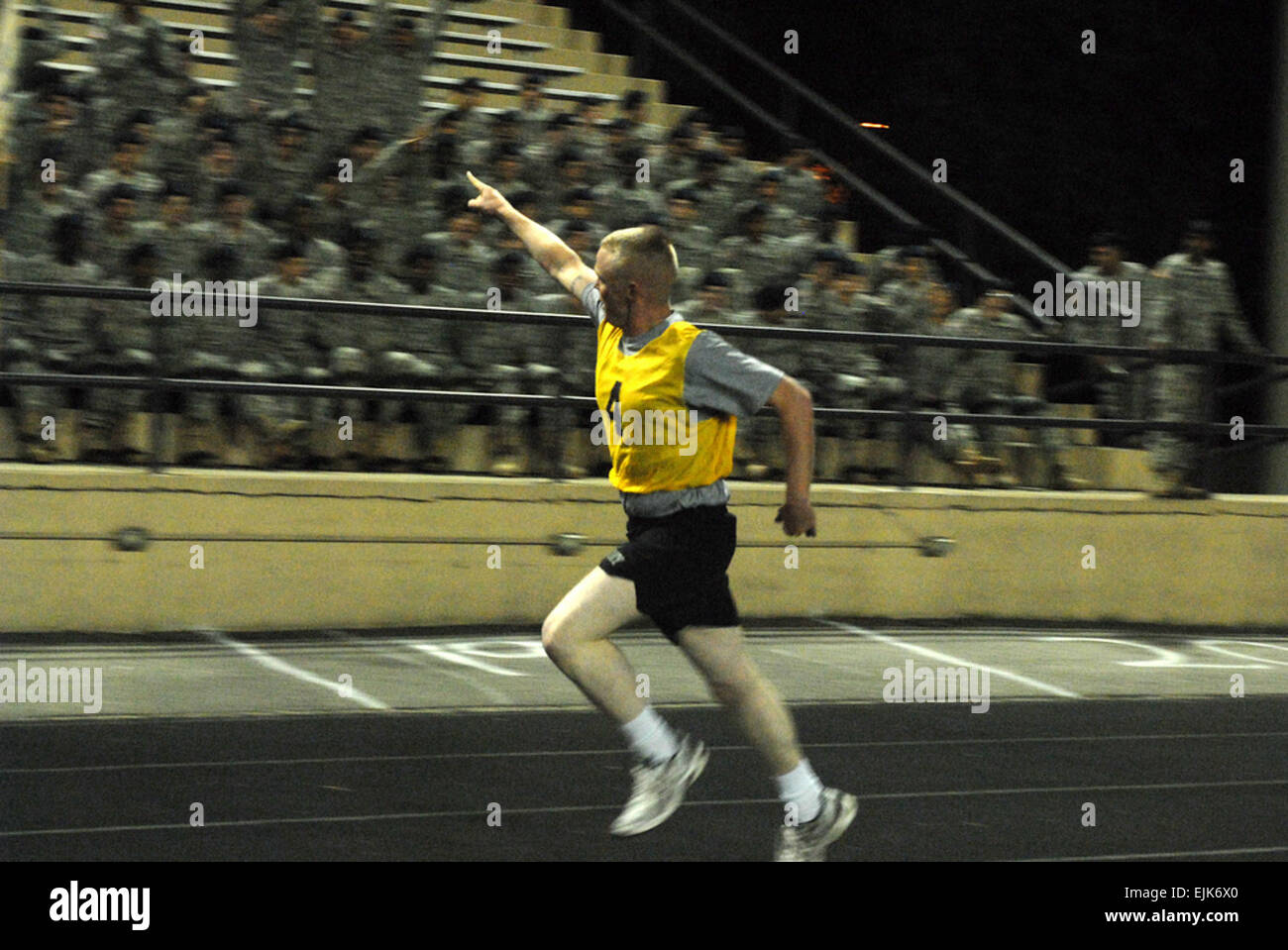 SSG Arron Butler works the crowd during the Army Physical Fitness Test ...