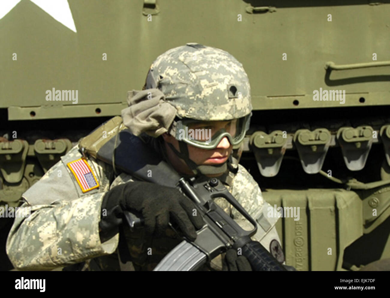 U. S. Army Spc. Charles Siler provides security during mobilization ...