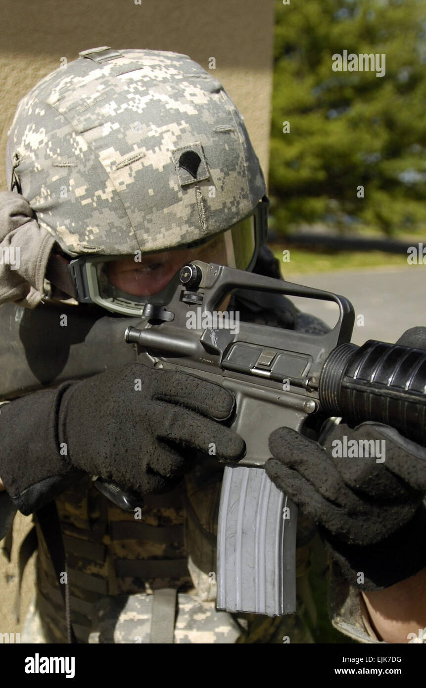U. S. Army Spc. Charles Siler provides security during mobilization ...