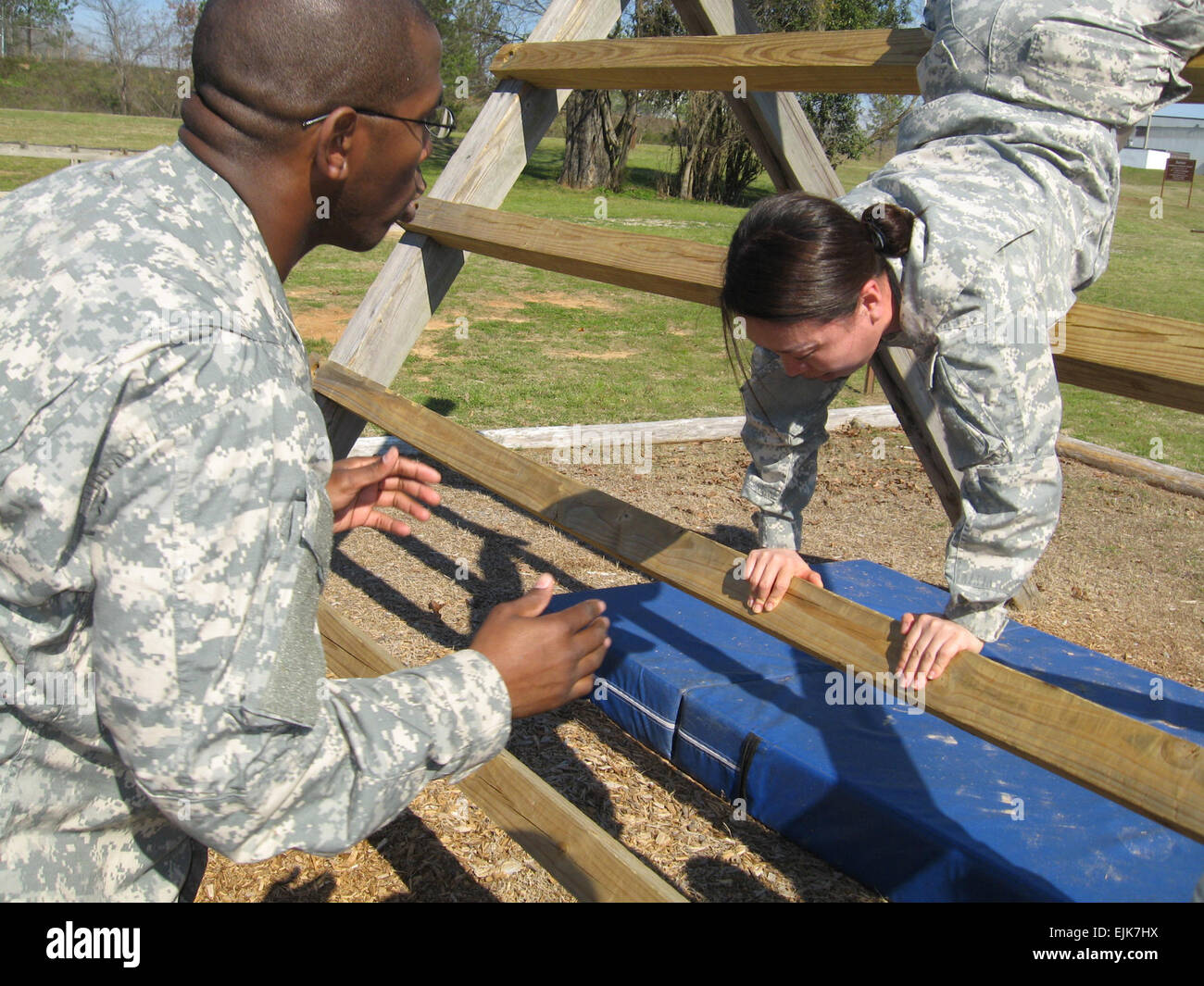 U.S. Army Officer Candidate Marvin Johnson gives advice to Officer ...
