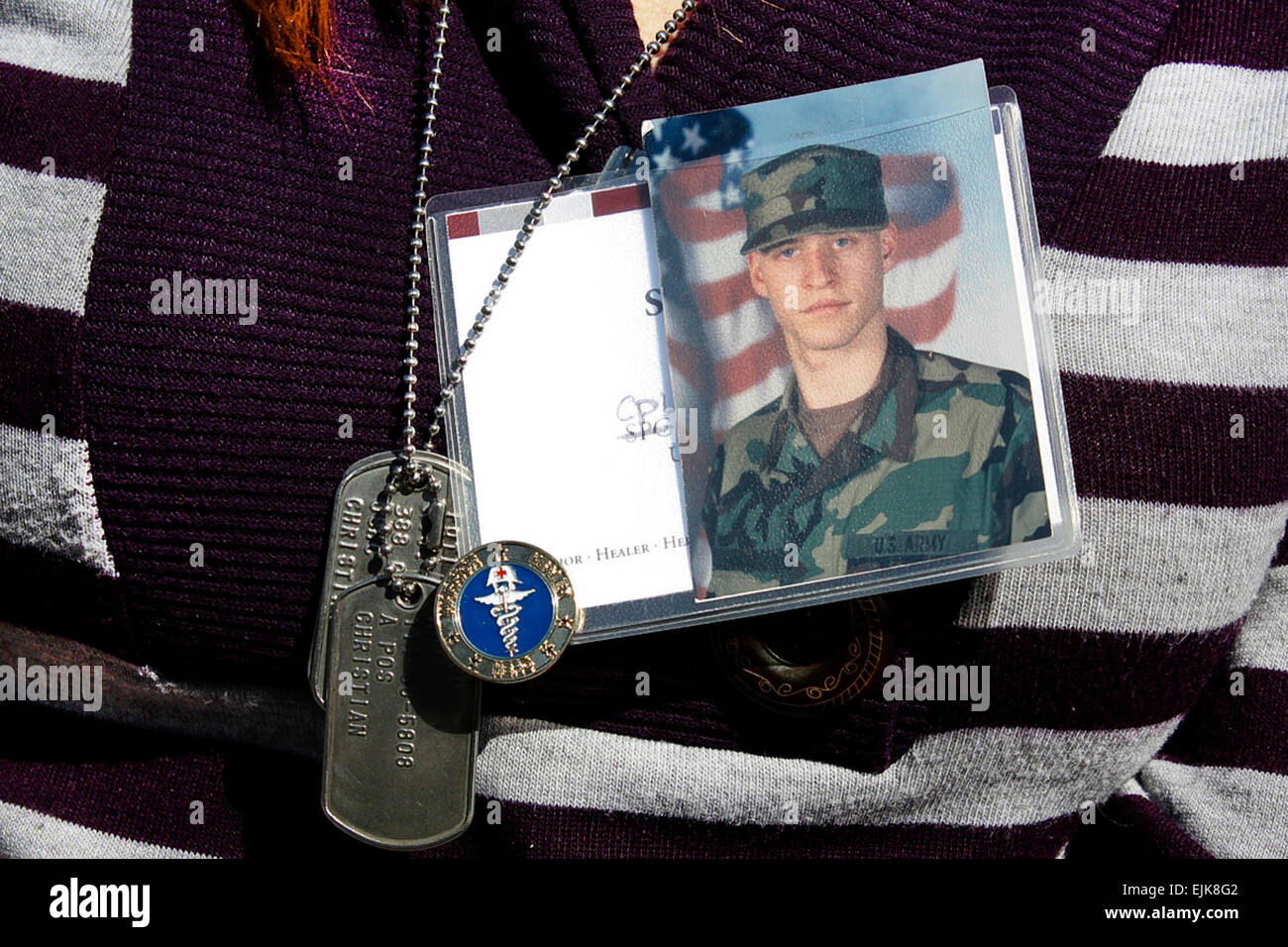 Sarah Fargo honors her brother's memory by wearing his photo and dog ...