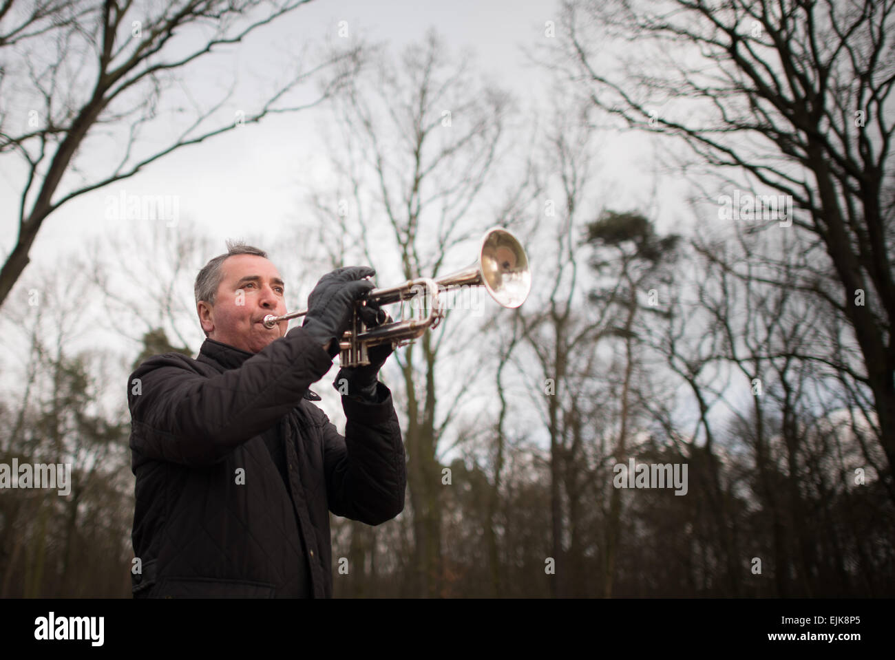 A bugler plays during a ceremonial funeral of soldiers who died during ...