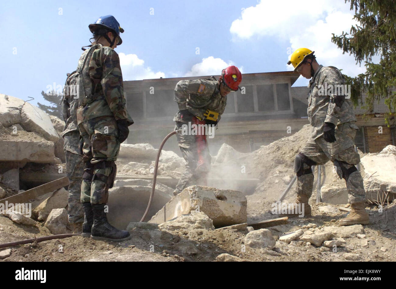 Members of the National Guard search for simulated wounded and dead ...