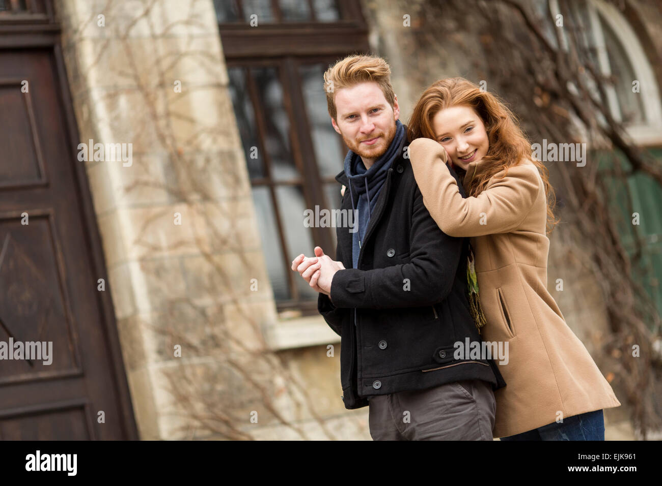 Young red hair couple at autumn park Stock Photo - Alamy
