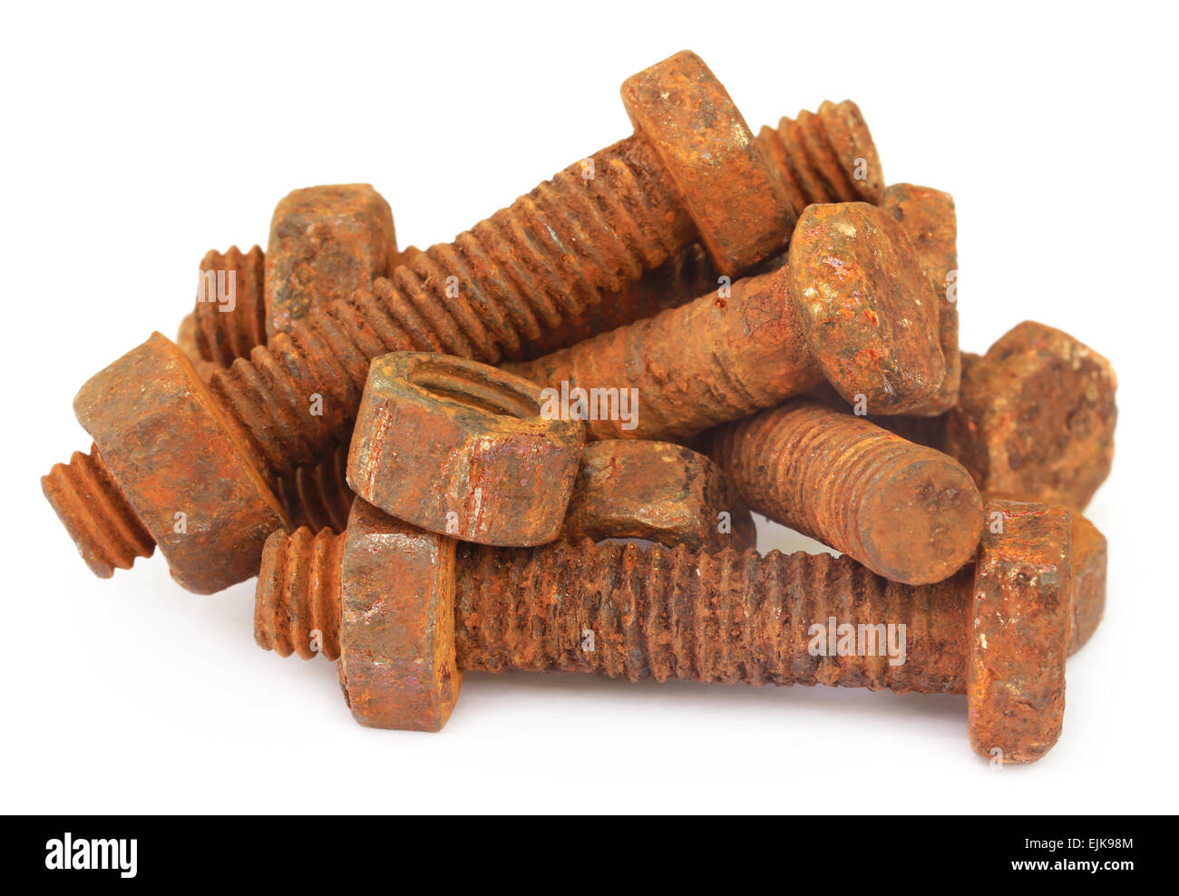 Rusty bots with nuts over white background Stock Photo - Alamy