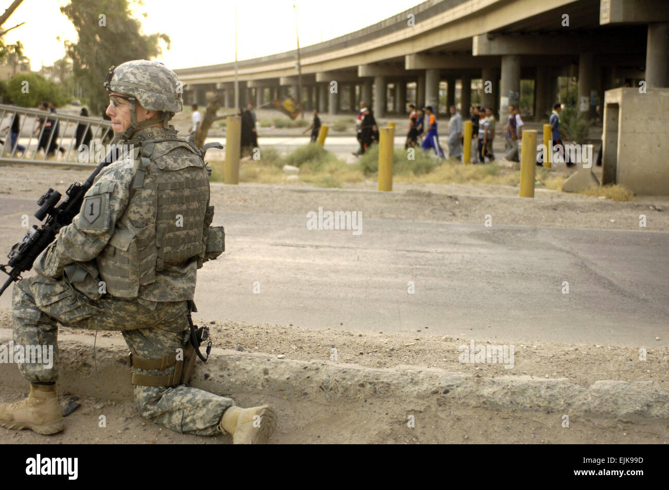 U.S. Army 2nd Lt. Jacob Becker observes the streets of Al Furat, Iraq ...
