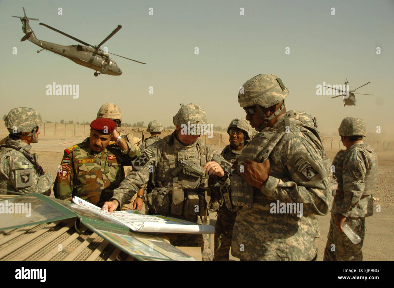 U.S. Army Lt. Gen. Lloyd J. Austin III right, commander of the XVIII ...
