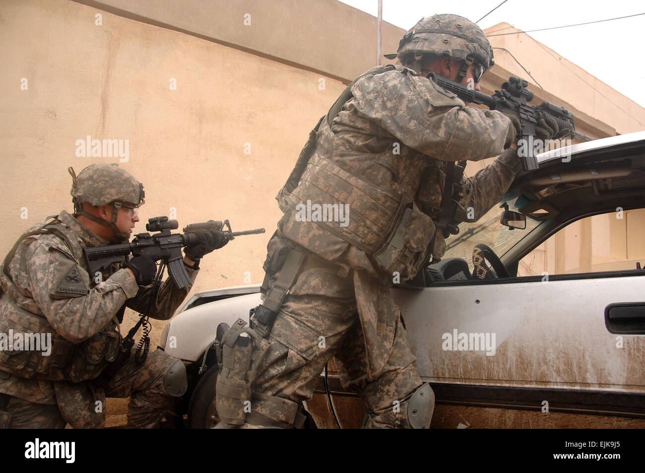 U.S. Army Soldiers from the military transition team assigned to 2nd ...