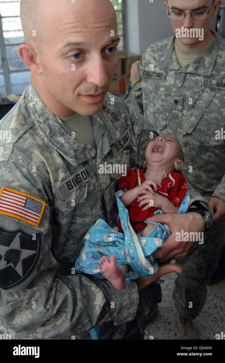 U.S. Army Maj. William Bimson, a surgeon with 2nd Squadron, 1st Cavalry ...