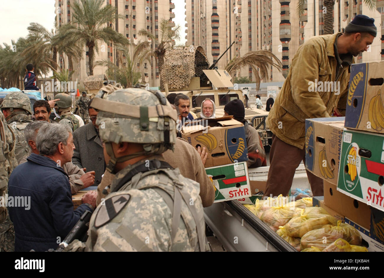Residents of Haifa Street receive food and aid from U.S. Army Soldiers ...