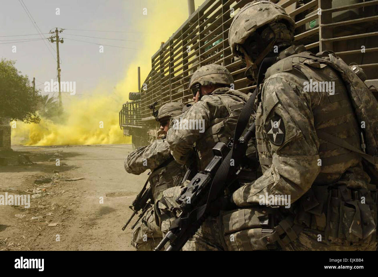 U.S. Army Soldiers from the 1st Stryker Brigade Combat Team engage anti ...