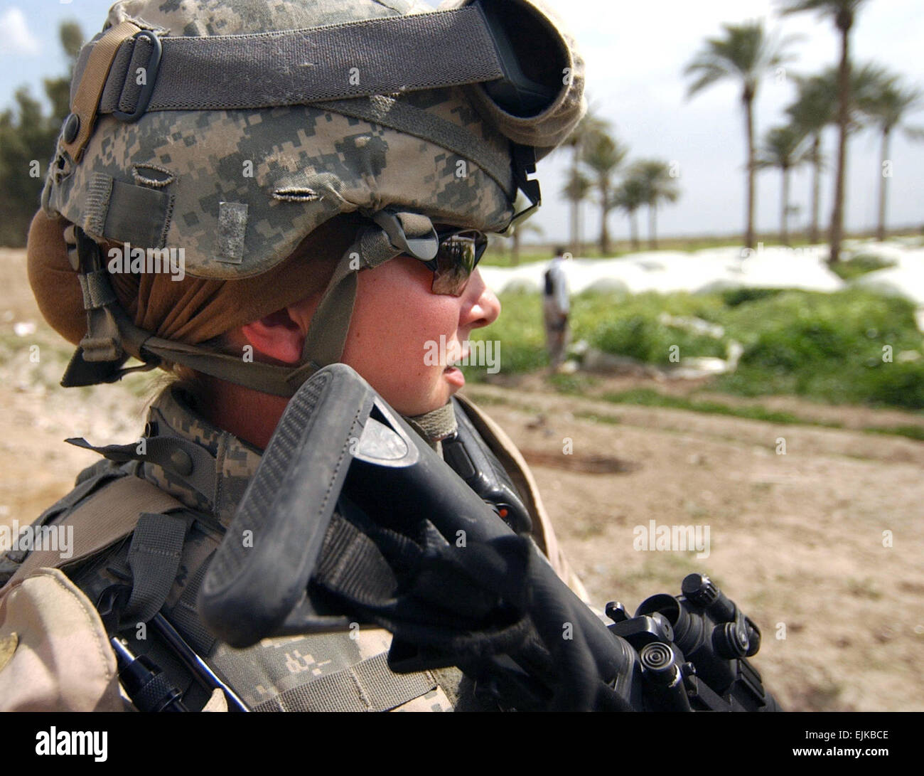 U.S. Army Sgt. Ashley Hort keeps her weapon at the ready as she ...